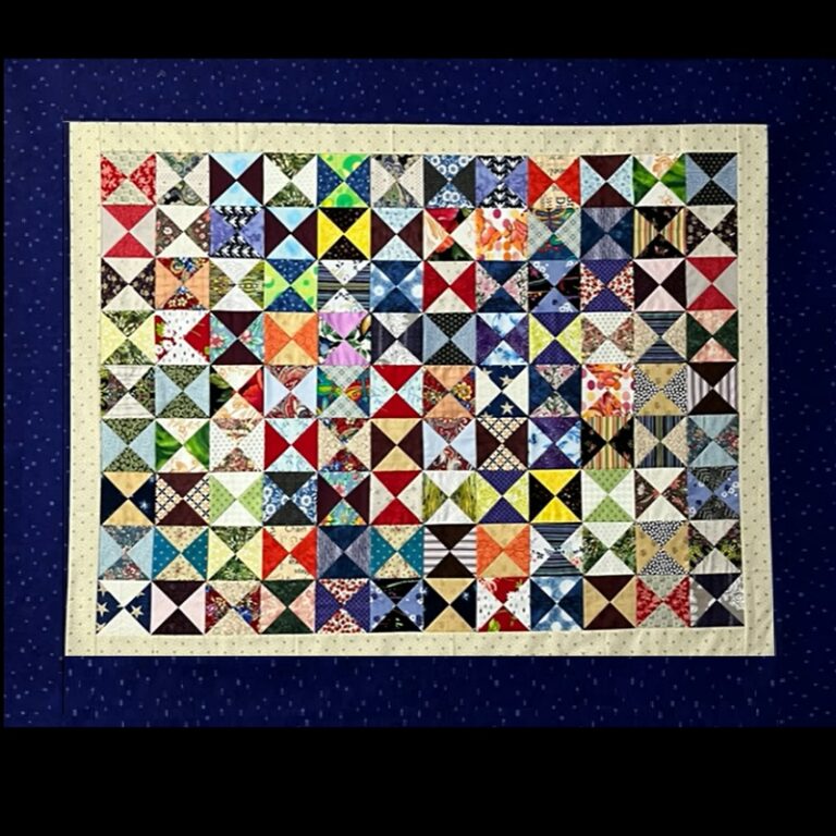 Scrappy Hourglass Quilt - Revelation Quilts